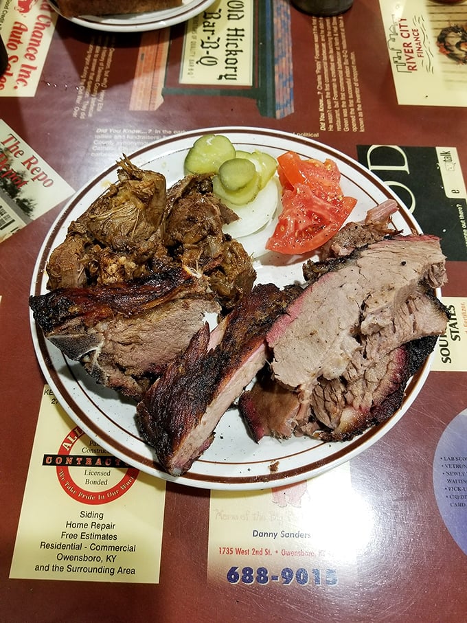The holy trinity of barbecue&mdash;beef, pork, and mutton&mdash;sharing a plate like old friends, each bringing its own personality to the smoky conversation.
