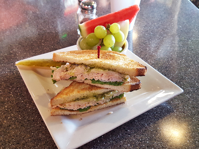 Pesto change-o! This turkey sandwich, with its vibrant green spread, is like springtime decided to take a delicious vacation between two slices of bread.