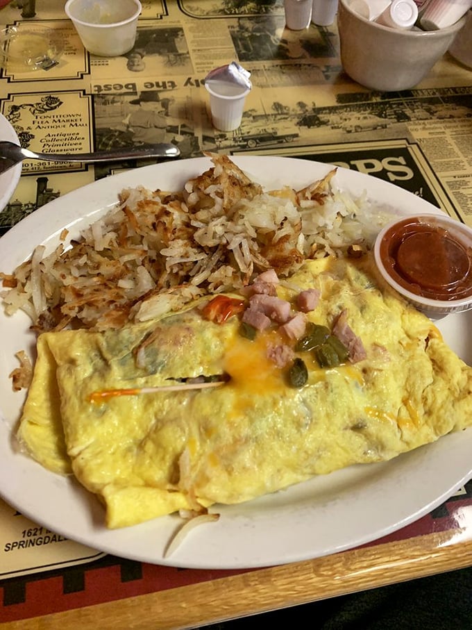 The Western Omelette: a cowboy's breakfast wrapped in a fluffy egg lasso, ready to wrangle your hunger.