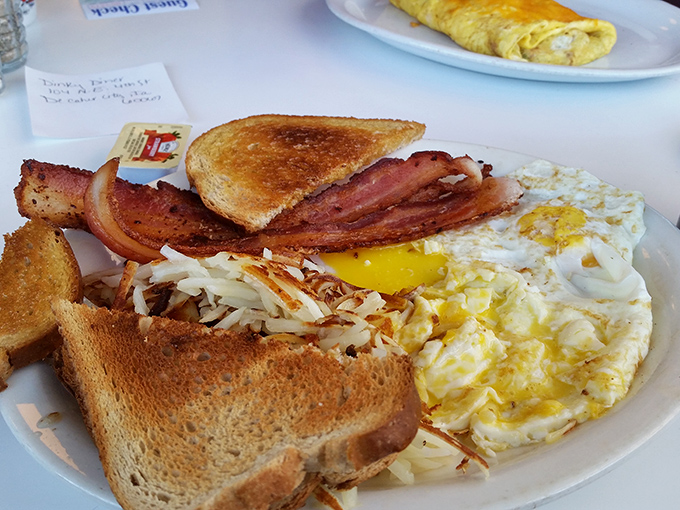 A breakfast platter that could fuel a farm worker... or a Netflix binge-watcher. Either way, you won't need lunch today.