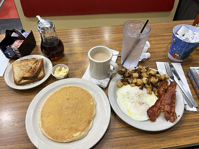 The breakfast spread that launches a thousand naps. That pancake is so perfectly golden it deserves its own Instagram account.