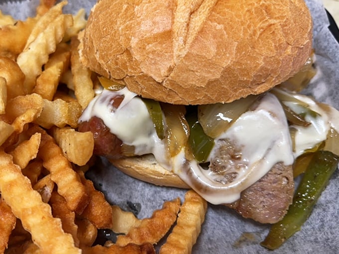 Burger alert! This juicy masterpiece is stacked higher than an air traffic control tower. Prepare for flavor takeoff!