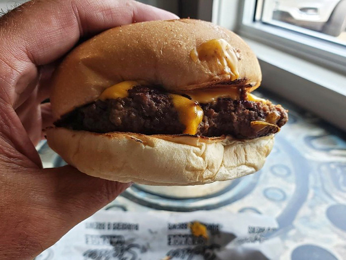 Holy cow! This burger isn't just a meal; it's a delicious feat of engineering that would make any gearhead proud.