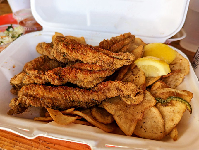Catfish so perfectly fried, it could convert even the most devoted chicken tender enthusiast. Crispy on the outside, tender on the inside - seafood nirvana!