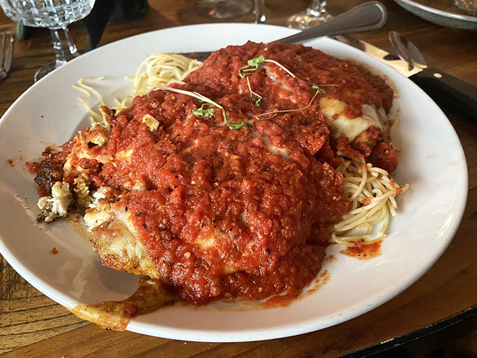 Who knew heaven could fit on a plate? This chicken parm is giving Italian grandmothers everywhere a run for their money.