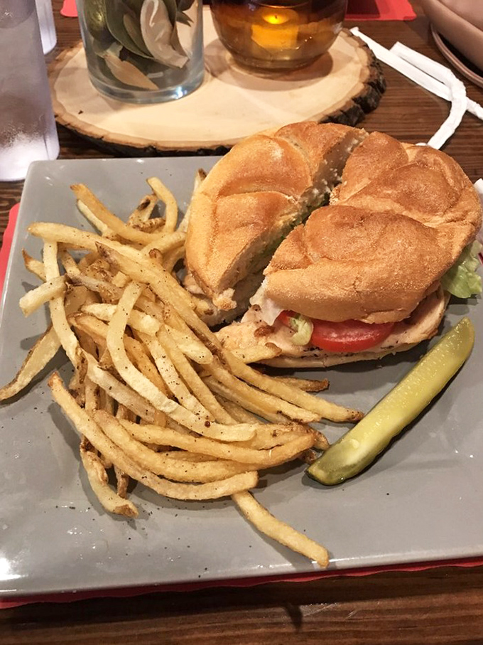 This sandwich isn't trying to impress Instagram&mdash;it's trying to impress your taste buds. Crispy fries and a pickle complete this lunch that screams "naptime afterward."