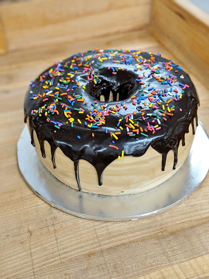 Holy Homer Simpson! This chocolate glazed donut isn't just a treat, it's a work of art. Sprinkles add a touch of whimsy to this classic indulgence.