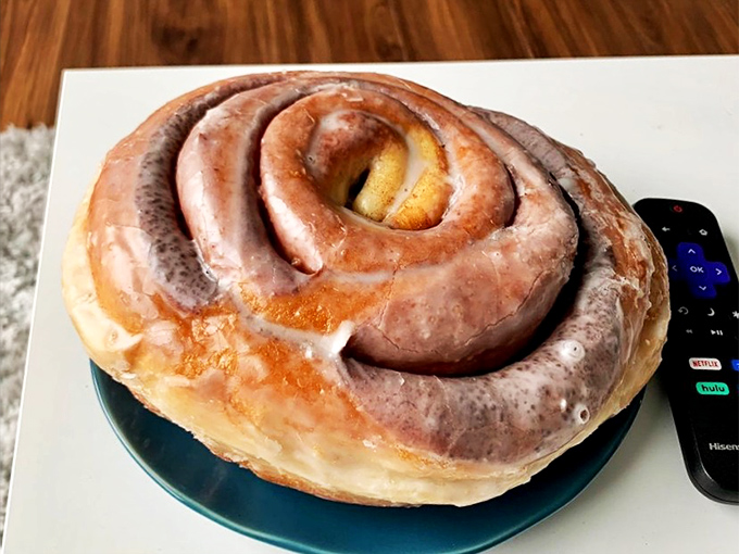The cinnamon roll that makes you question every other cinnamon roll you've ever committed to. A spiral of breakfast bliss that demands a moment of silence.