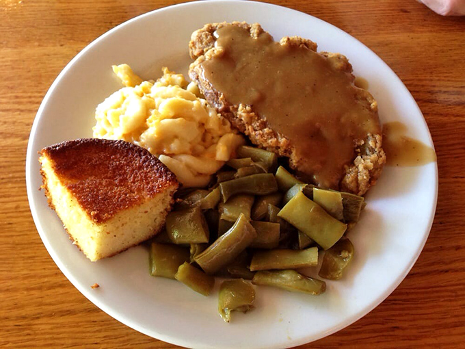 Country Fried Steak: Where comfort food meets cardiac arrest. But trust me, it's worth every delicious, gravy-soaked bite.