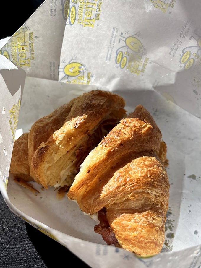 Flaky, buttery, and ready for its close-up! This croissant could give the Mona Lisa a run for her money in the "enigmatic smile" department.