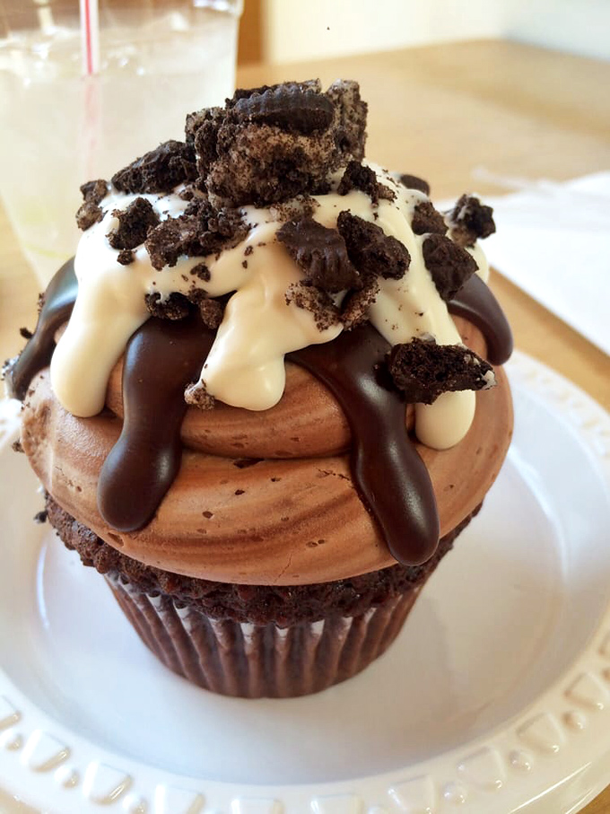 Behold, the Everest of cupcakes! This chocolatey masterpiece is so tall, it should come with its own Sherpa guide.