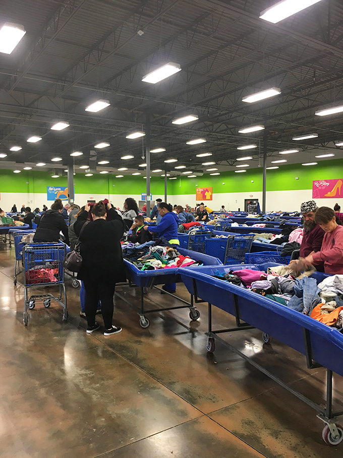 The thrill of the hunt brings shoppers from all walks of life. Notice the focused expressions—part archaeologist, part bargain hunter, all determination.
