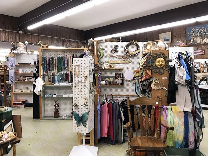 A cornucopia of curiosities! From delicate china to funky figurines, this display is like your eccentric aunt's attic come to life.