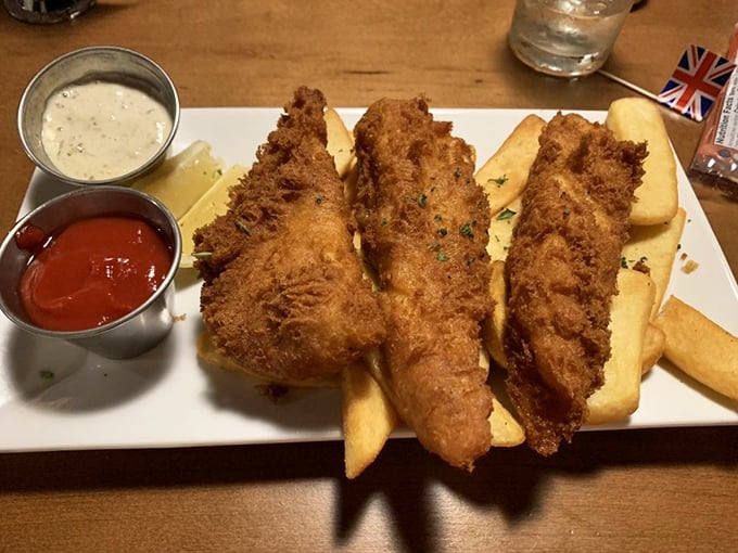Fish so fresh, it might just swim off your plate! These golden-battered beauties are crispier than my dad's jokes at Thanksgiving.