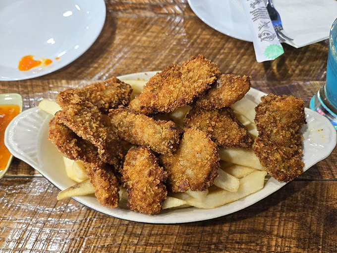 Golden, crispy, and utterly irresistible. These fried oysters are like the ocean's version of popcorn &ndash; bet you can't eat just one!