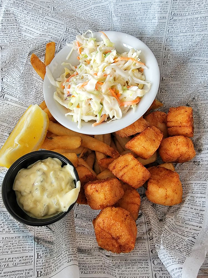 Golden-fried perfection on a plate! These scallops are so crispy, they could give potato chips a run for their money in the crunch department.
