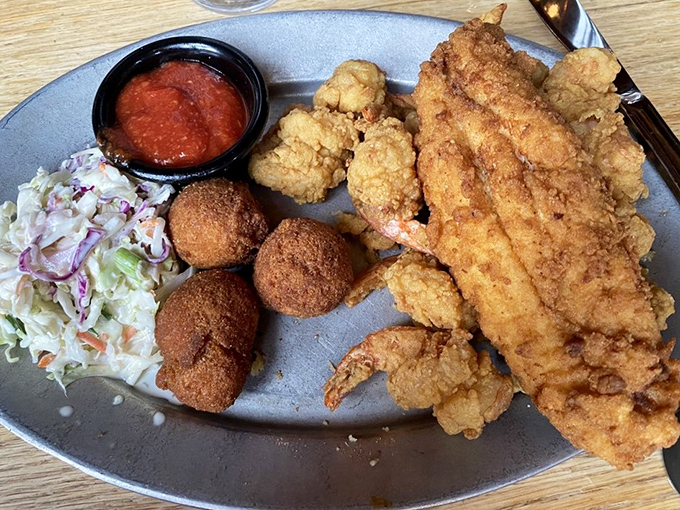 The fried seafood platter offers an oceanic tour of the Atlantic's bounty, each morsel encased in a golden jacket of perfectly crisp batter.