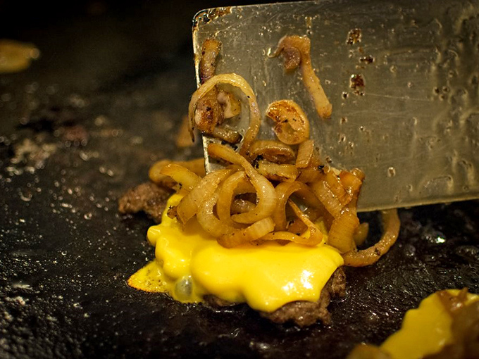 Sizzle and pop! These grilled onions are the unsung heroes, ready to elevate your burger from great to unforgettable.