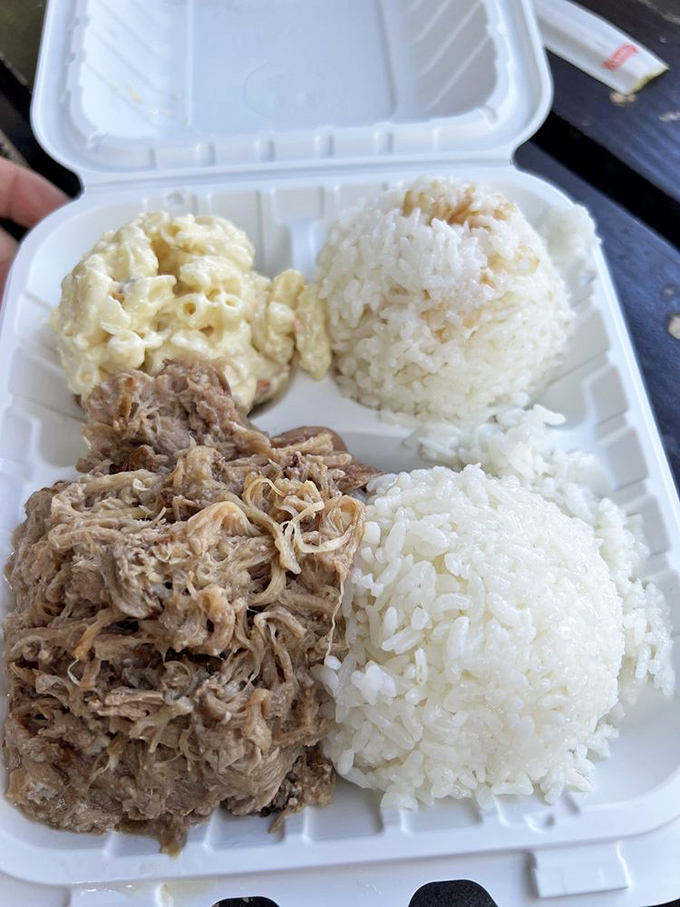 Kalua pork so tender, it practically melts on your fork. It's like a luau in your mouth, minus the fire dancers.