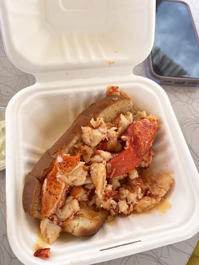 Lobster roll heaven! This beauty is packed with so much meat, it's like the lobster gym finally paid off.