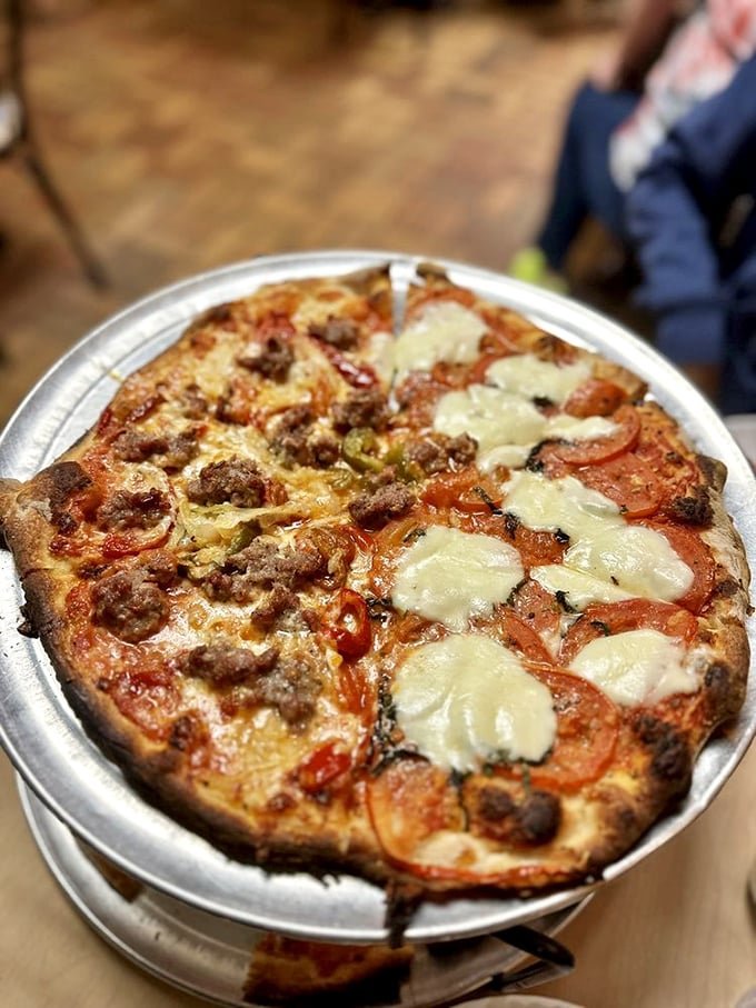 A tale of two pizzas! Margarita's elegant simplicity meets the bold flavors of sausage and onion in this dynamic duo.