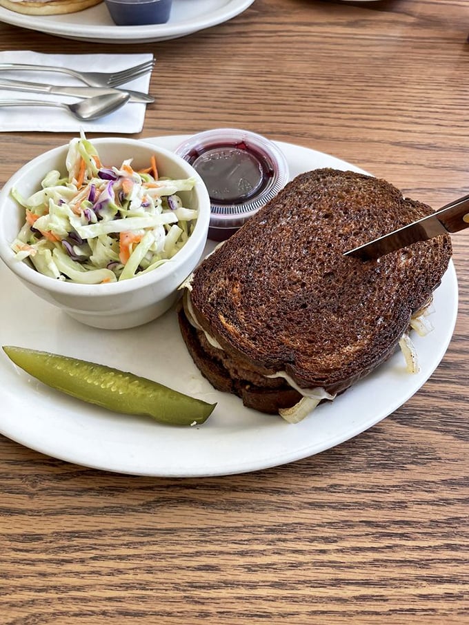 The patty melt: where bread meets beef in a dance of deliciousness. Served with a side of nostalgia and crisp coleslaw.