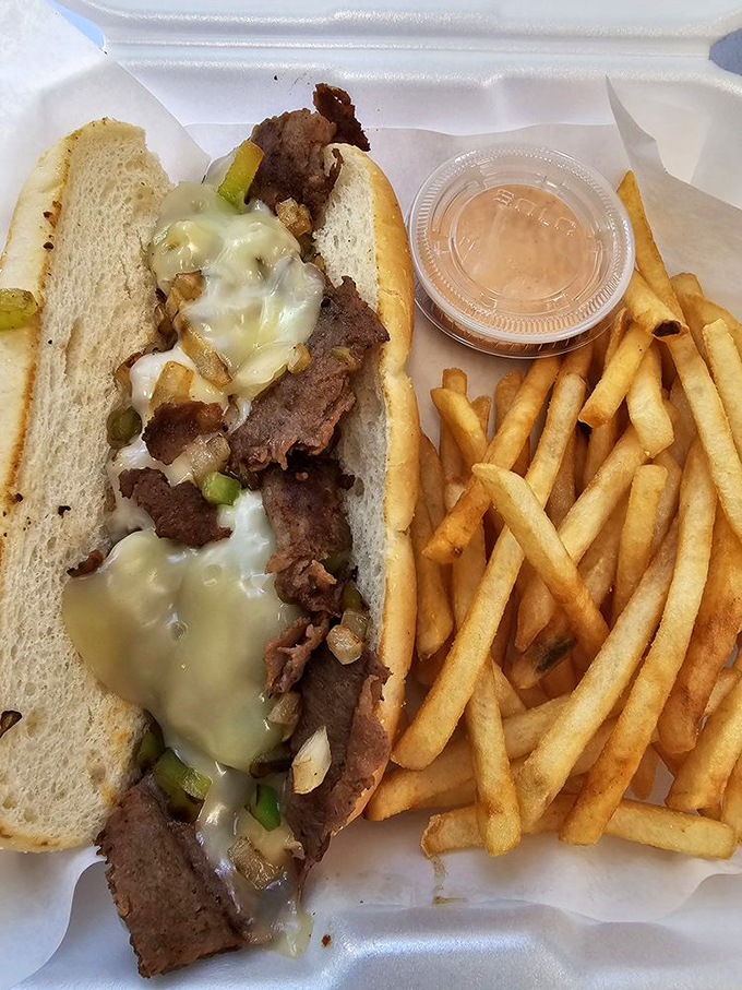 A classic burger, dressed to impress. Those pickles aren't just garnish, they're the supporting actors in this meaty drama.