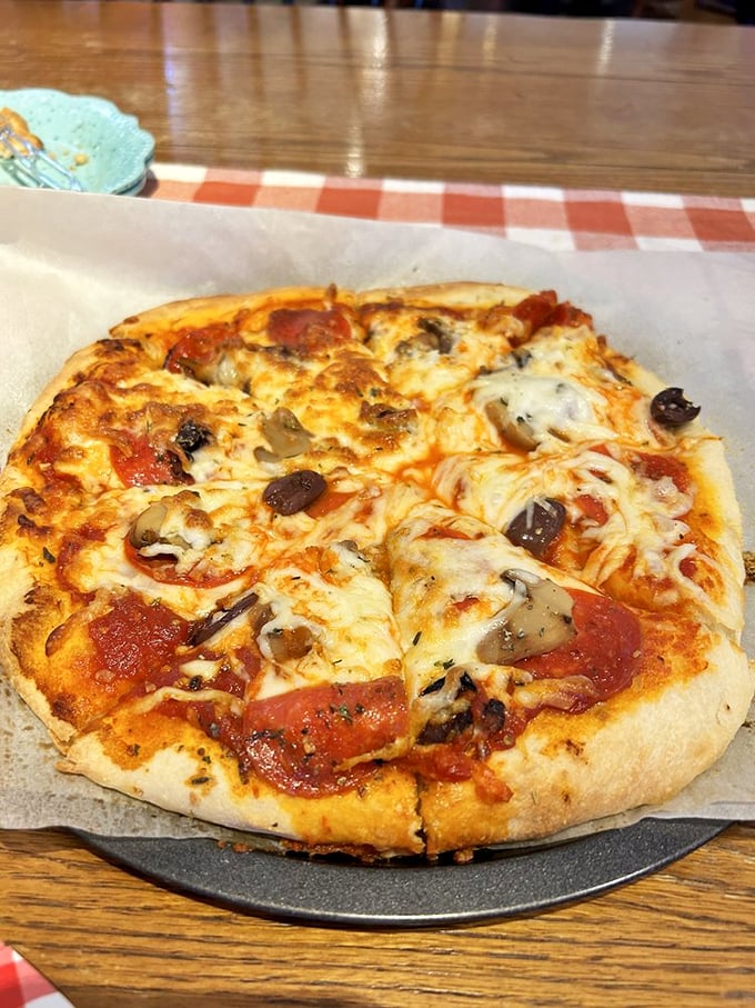 Who said Pie Town was all about sweets? This pizza proves that savory pies can be just as show-stopping as their sugary cousins.