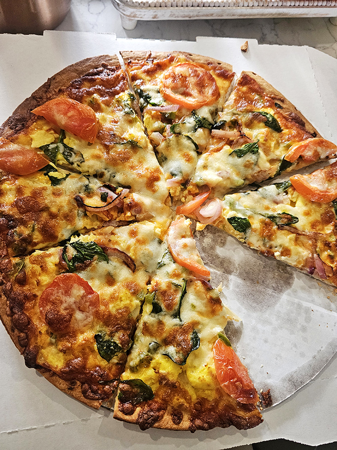 Pizza by day, donuts by night? Cranky Al's is the superhero of comfort food! This pie looks so good, it might just make you forget about donuts... almost.