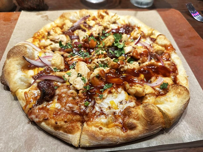 This isn't just pizza&mdash;it's a BBQ chicken masterpiece with a crust that somehow manages to be both pillowy and crisp. Napkins required.