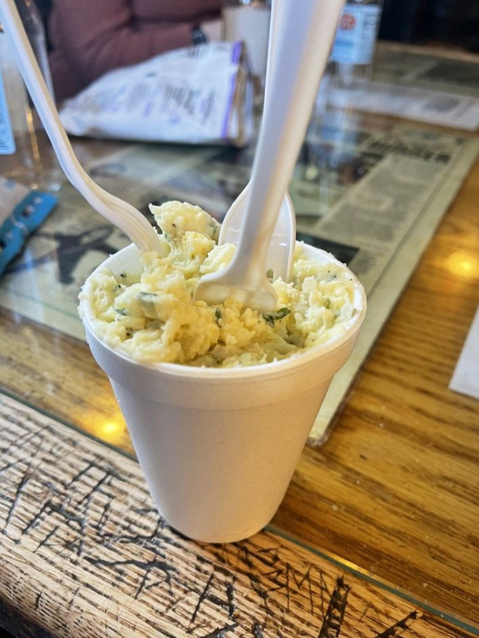 Creamy, dreamy potato salad &ndash; the unsung hero of any burger joint. It's like a hug for your taste buds.