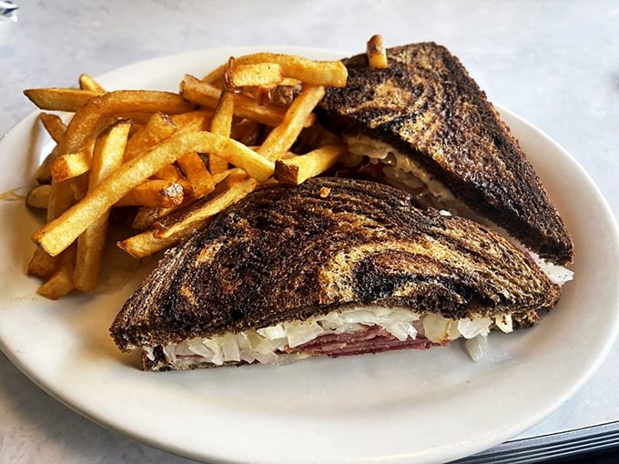 The Reuben that launched a thousand cravings. This sandwich isn't just lunch; it's a work of art between two slices of marbled rye.