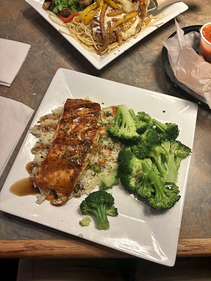 Who says you can't teach an old fish new tricks? This salmon dish is swimming in flavor, paired with rice and broccoli for a meal that's both indulgent and virtuous.