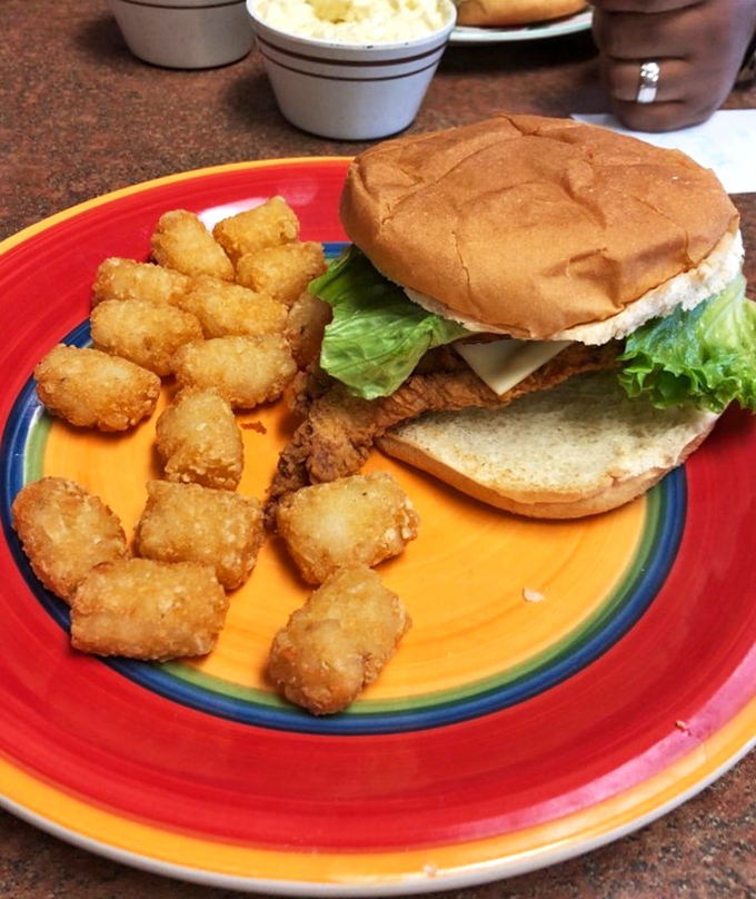 Behold, the sandwich that ate Springdale! This behemoth could feed a small army, or one very determined trucker. Tater tots included for "balance."