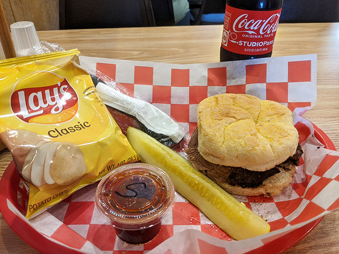 A sandwich that demands to be photographed before eaten, though your patience will be tested. Paired with chips and a pickle&mdash;simple perfection.