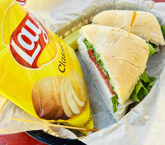 Sandwich perfection! Nestled between golden buns, this beauty is ready to make your lunch break feel like a mini-vacation.