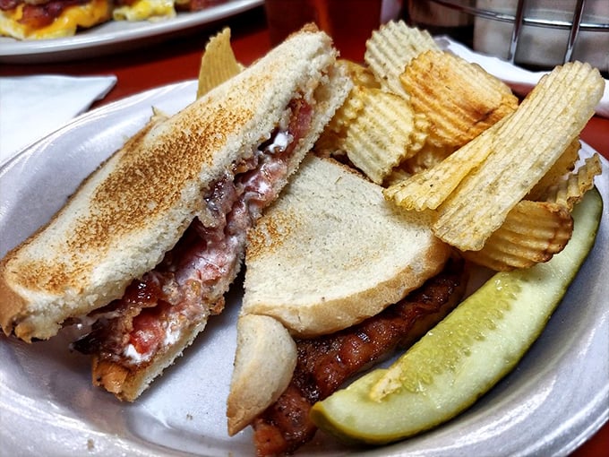 Sandwich perfection: Layers of flavor stacked higher than a Derby Day hat. Don't forget the crispy sidekicks!