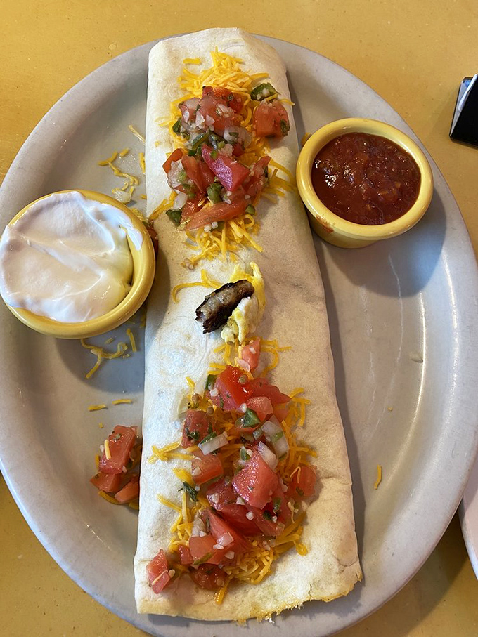 Breakfast burrito or edible work of art? This tortilla-wrapped masterpiece is a fiesta of flavors, complete with a side of morning motivation.