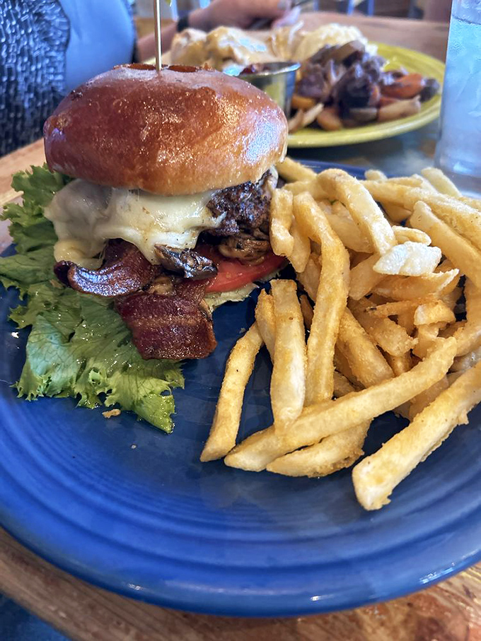 Burger bliss! This bad boy is stacked higher than my to-read pile. It's not just a meal, it's a delicious adventure.