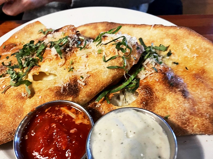 Stromboli or work of art? This golden-brown beauty is stuffed with enough flavor to make an Italian grandmother weep with joy.