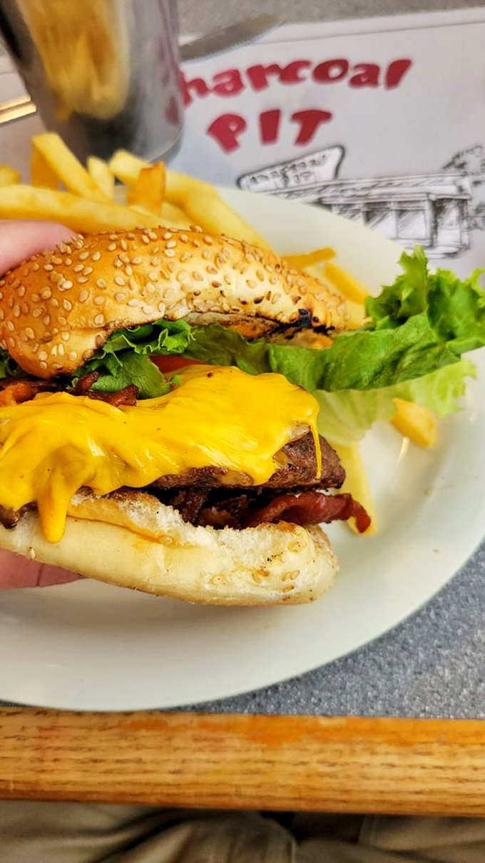 Behold the Summit Burger in all its glory! This cheese-draped beauty is ready for its close-up &ndash; and your taste buds are ready for true love.