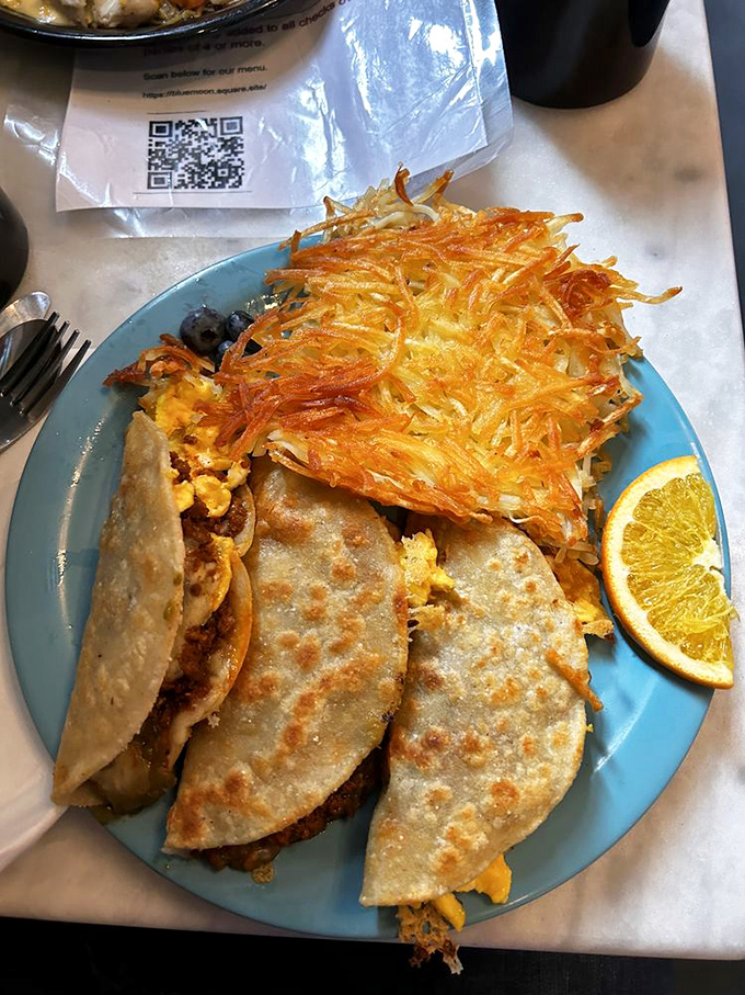 Who says you can't have tacos for breakfast? These morning morsels are doing the breakfast burrito tango with a side of crispy hash browns.