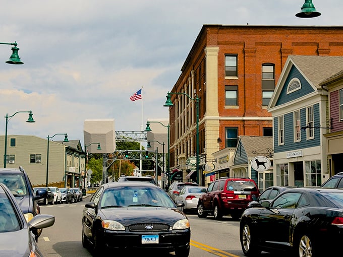 Small town, big personality. With flags waving and history whispering, this street scene is pure Americana on parade.