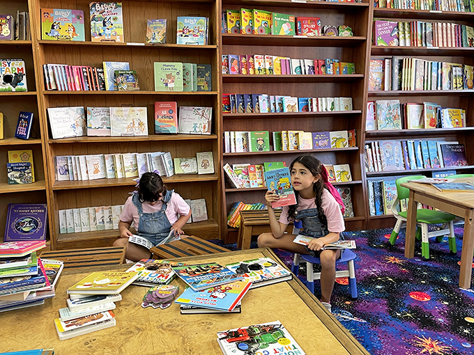 Young minds at work! These little bookworms are proof that the magic of reading is alive and well in the digital age.