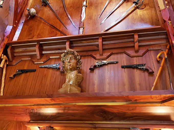 From swords to statues, these wall decorations tell tales of adventure. Indiana Jones would feel right at home among these treasures.