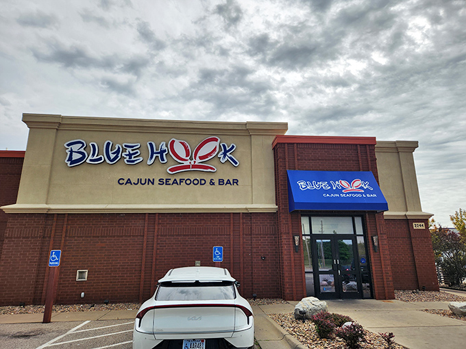 Blue Hook's sleek exterior is the James Bond of seafood joints - smooth, sophisticated, and probably packing some spicy secrets.