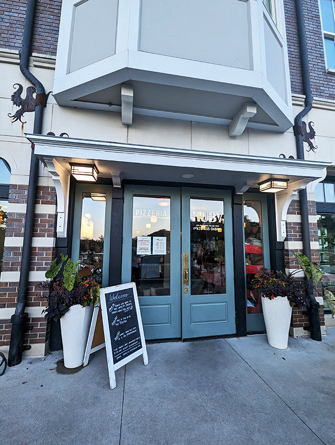 Pizzeria Ruby: Where pizza gets the red-carpet treatment. This sleek exterior hints at the gourmet delights waiting inside.