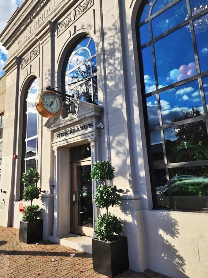 Strickland's Steakhouse: Where time stands still, but flavors race forward! This classic facade hides a world of meaty wonders.