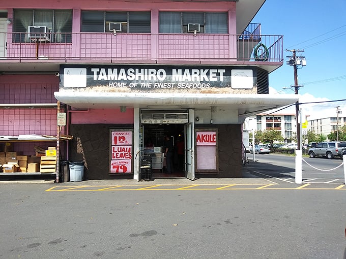 Tamashiro Market: Follow the giant crab to seafood nirvana! This pink landmark is like Willy Wonka's factory, but for fish enthusiasts.