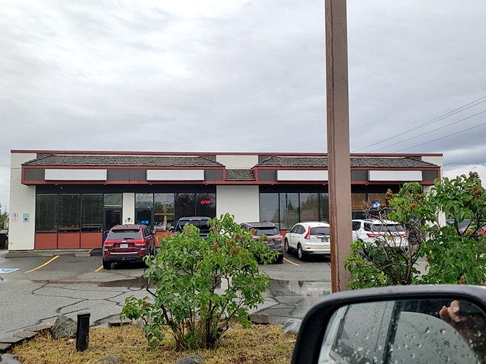 Pizza perfection in progress! Larson's busy parking lot is a testament to the mouthwatering magic happening inside.